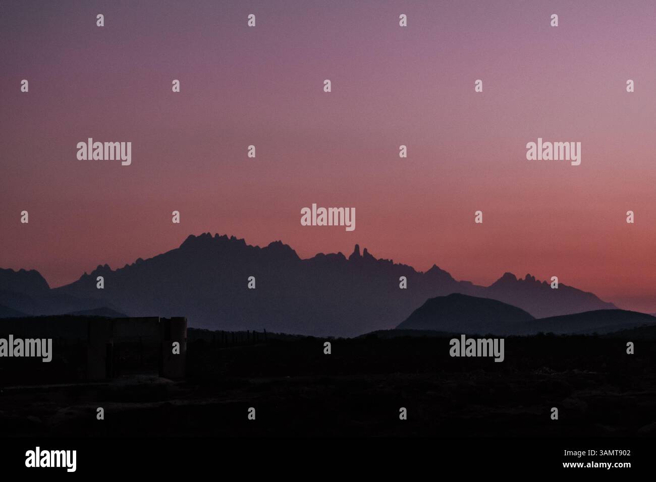 Colorful twilight over jagged mountains near Delisha Beach, Socotra ...