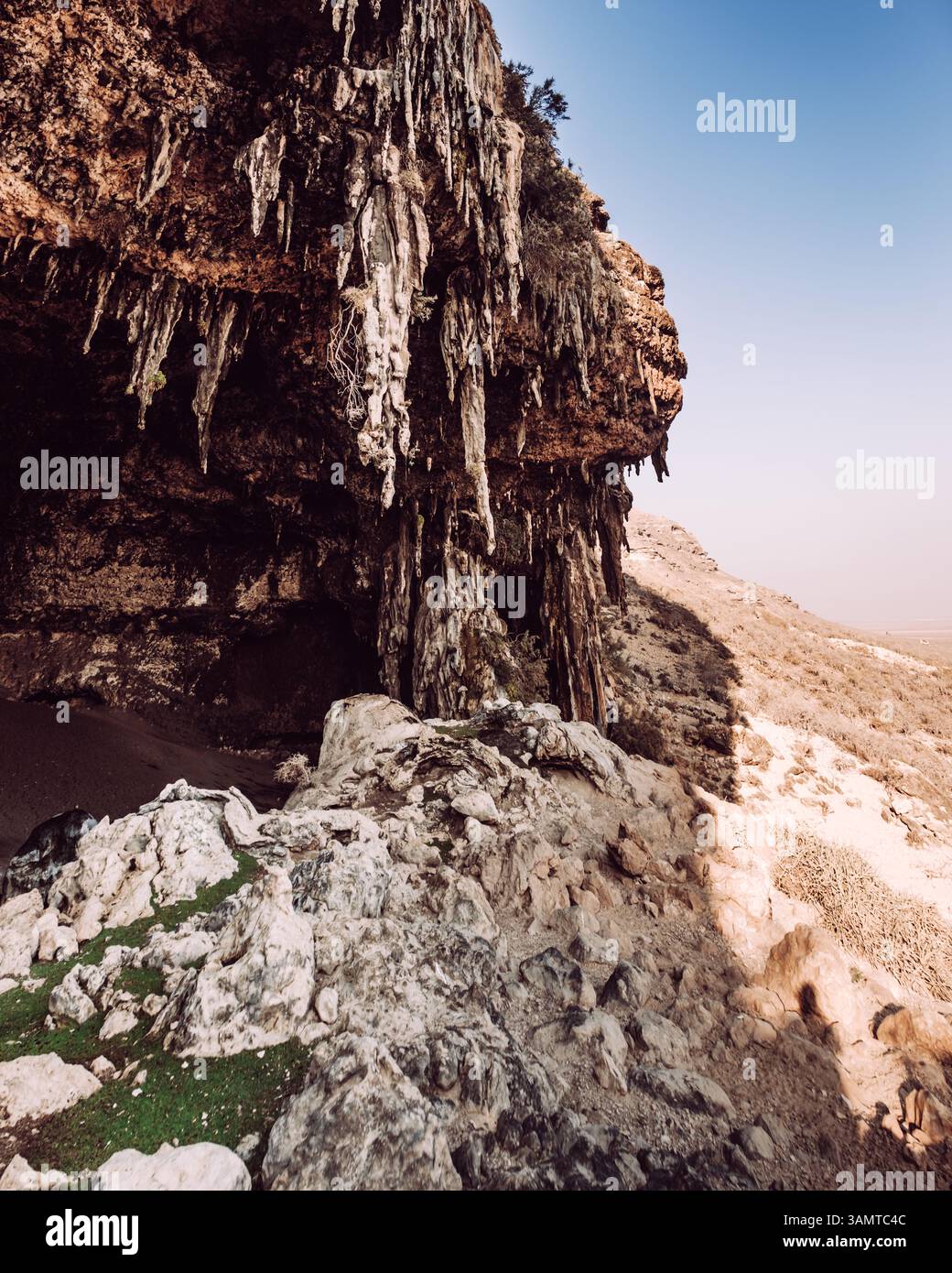 Rocky entrance of Dogub Cave with hanging formations, Socotra, Yemen ...