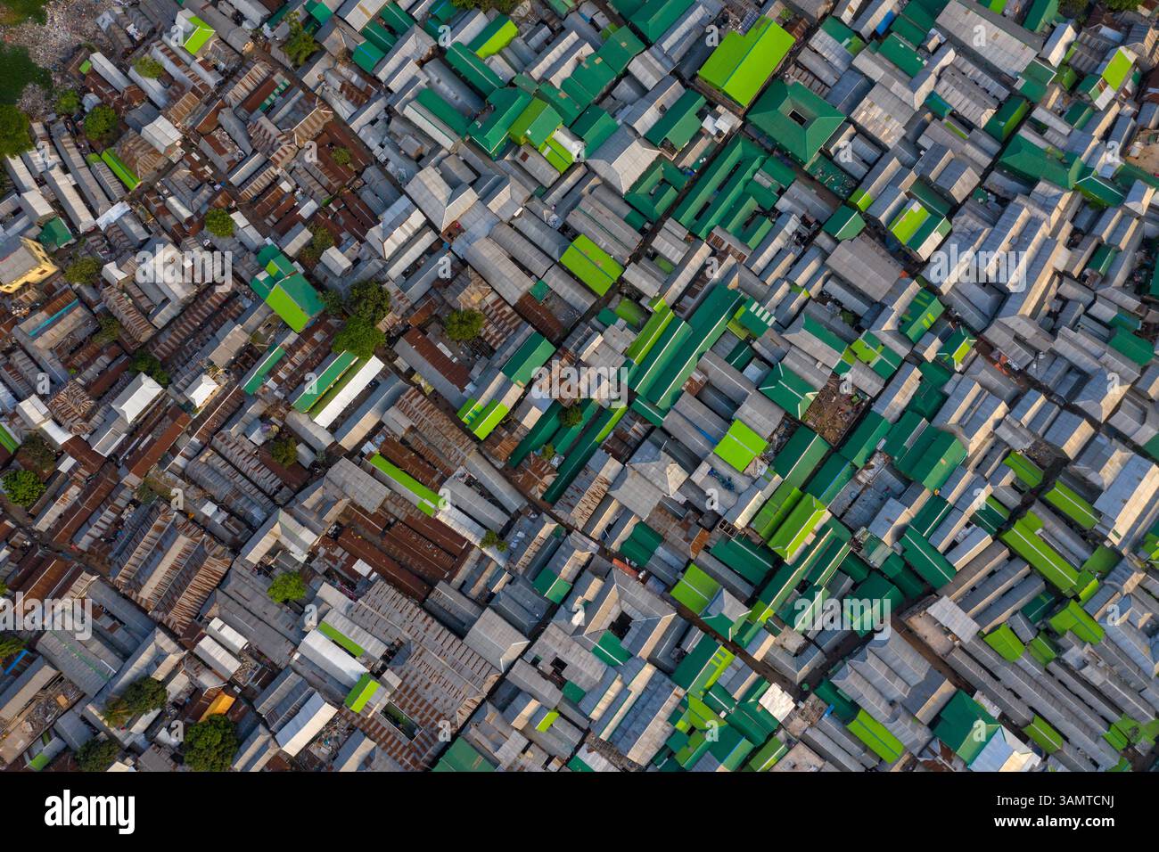 Aerial view of a large slum area along Banani lake, a crowded slum ...