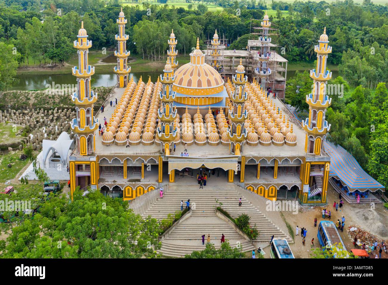Aerial view of Gombuj Masjid islamic mosque along Jhinai river in ...