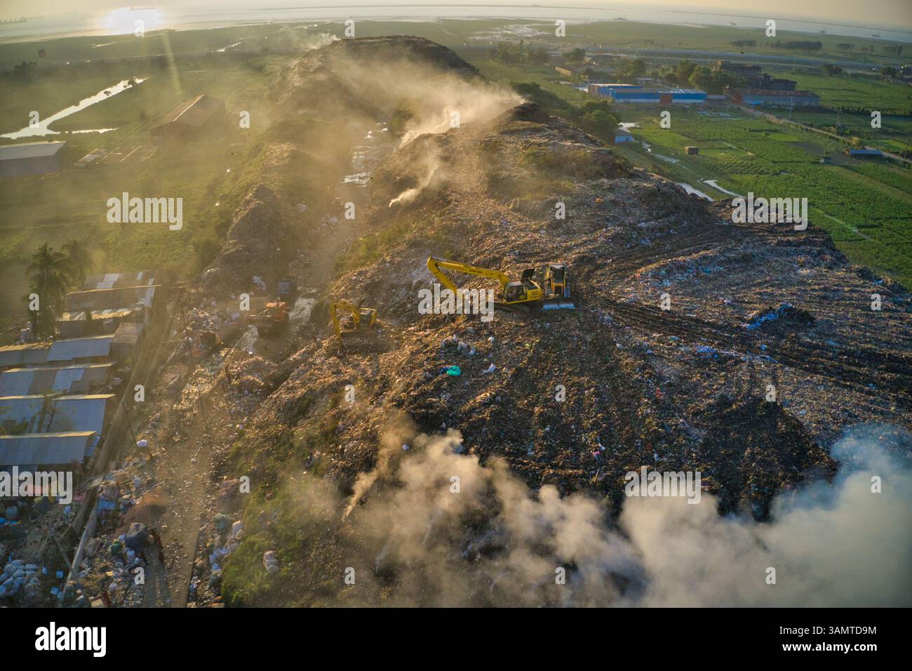 Burning landfill dumping site aerial hi-res stock photography and ...