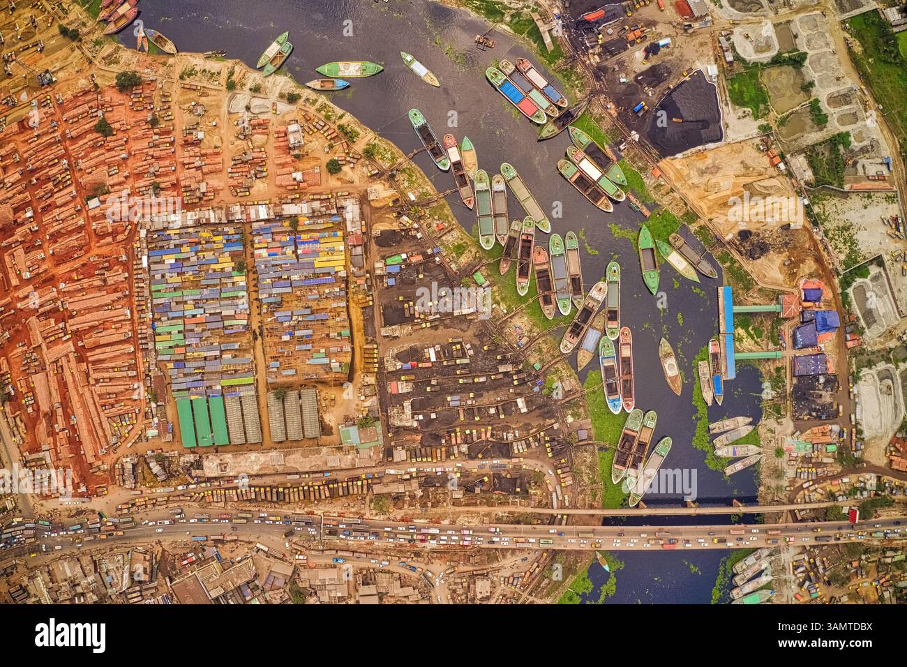 Aerial view of a group of ferry boat under construction in a shipyard docked along Buriganga ...