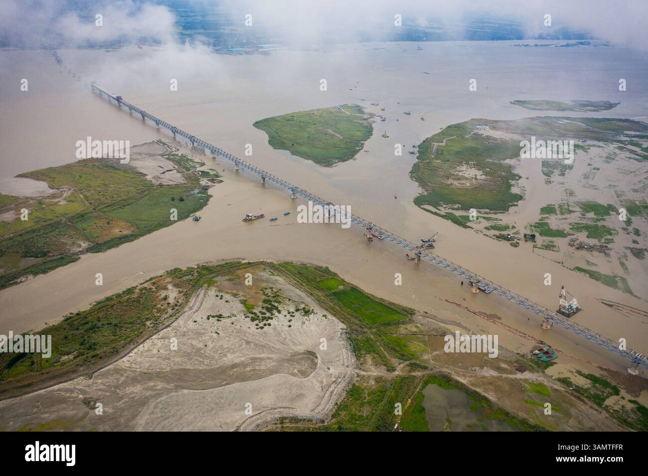 Aerial view of a construction site on Padma bridge crossing Padma river ...