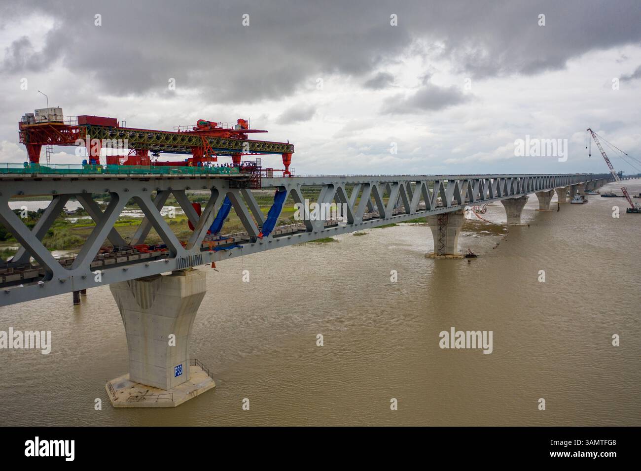 Aerial view of a construction site on Padma bridge crossing Padma river ...