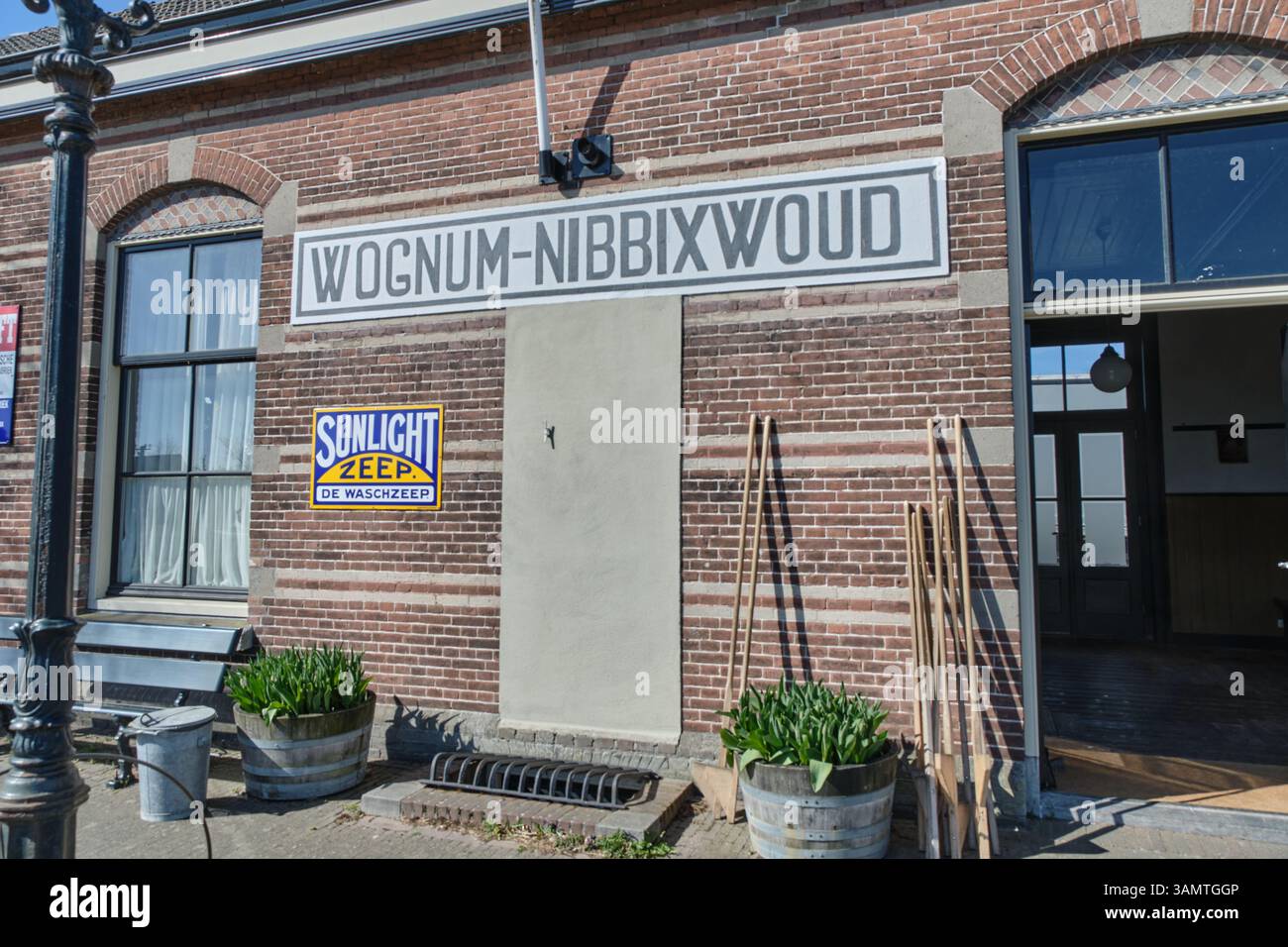 Old brick railway station facade with the name Wognum-Nibbixwoud, in ...
