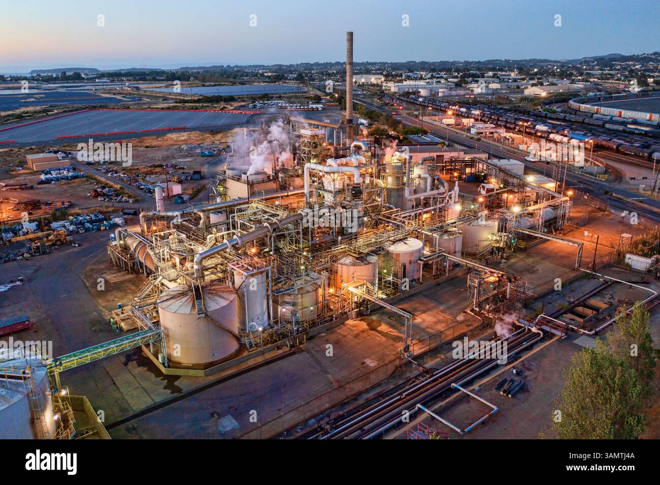 Aerial view of oil refinery with pipelines and chimneys in Richmond ...