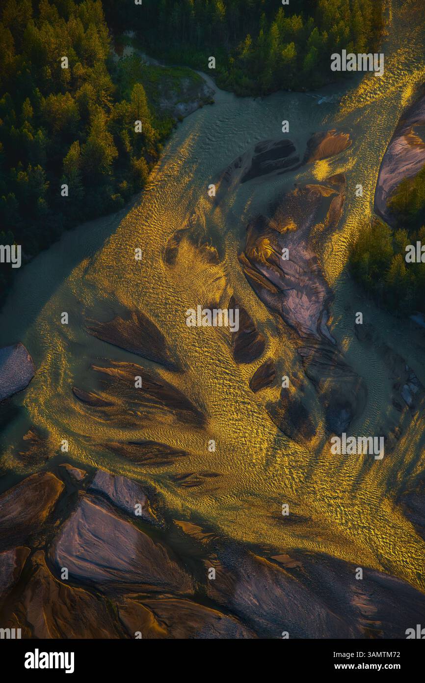Aerial view of winding Golden River through Juneau Ice Field, Alaska ...