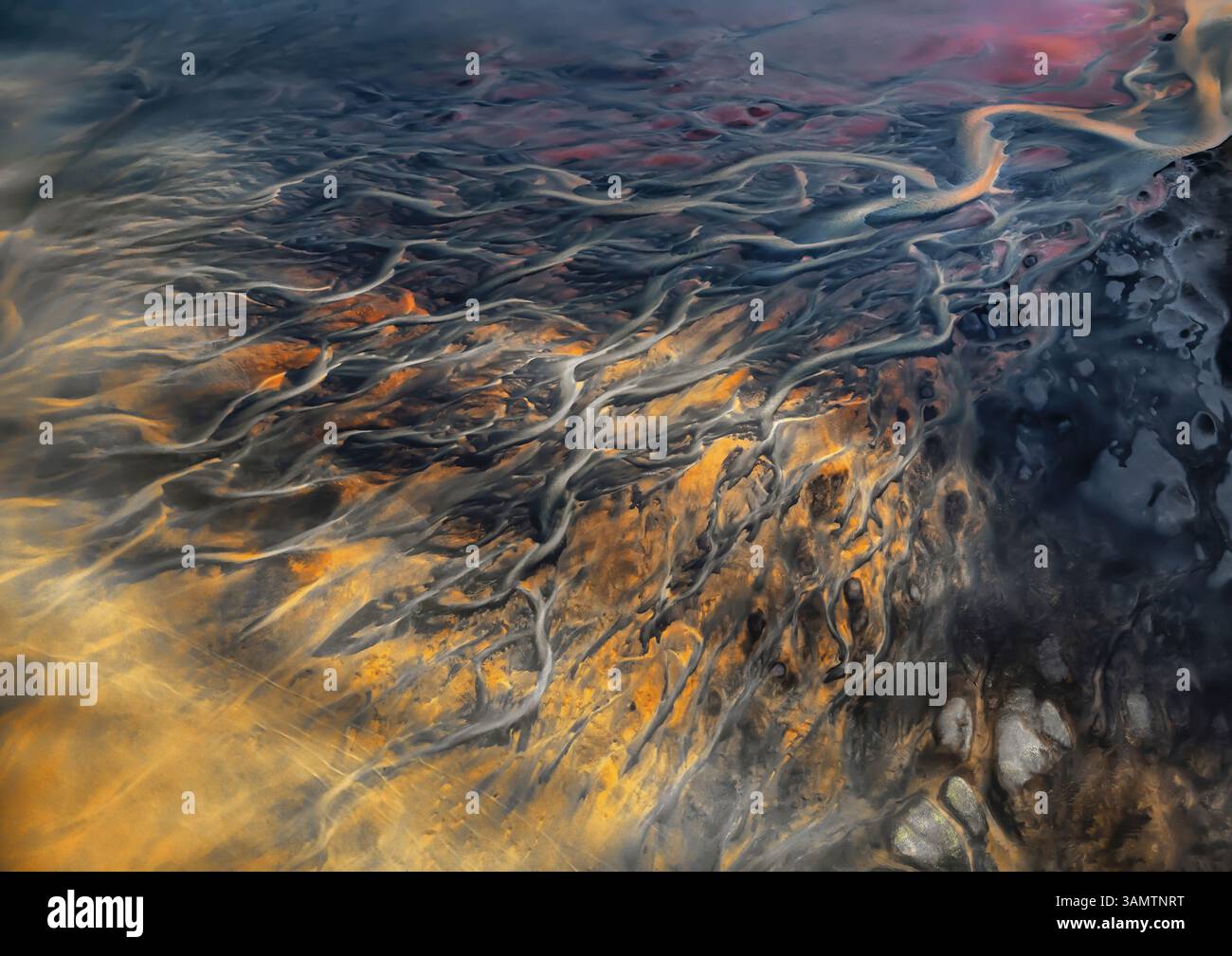 Aerial view of abstract water formation from a river estuary in ...