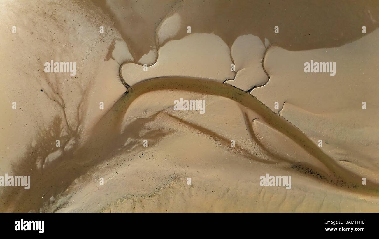 Aerial view of beautiful salt flats and winding river at the Tyne ...