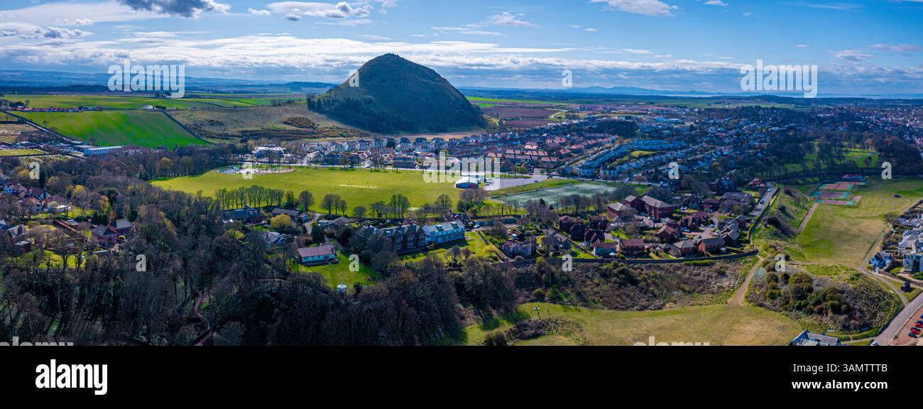 Aerial view of North Berwick Law, village, and green fields, North ...