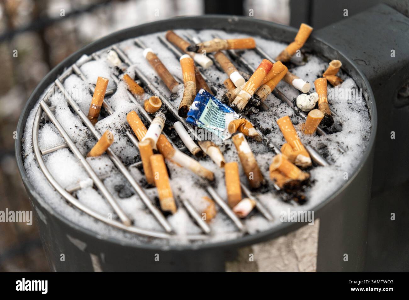 Augsburg, Bavaria, Germany - January 14, 2024: Overfilled ashtray in ...