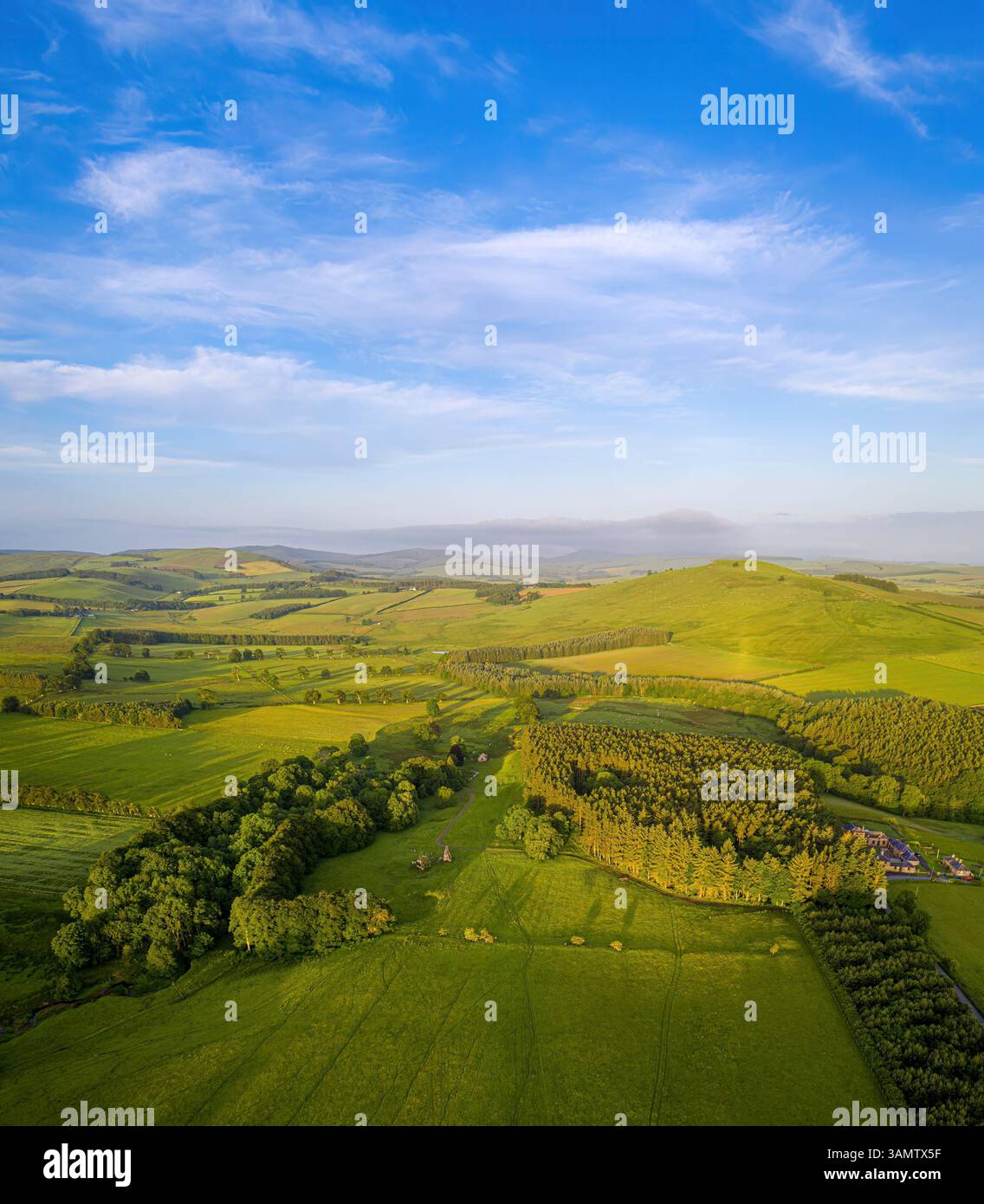 Aerial view of serene Scottish landscape with vibrant greenery and ...