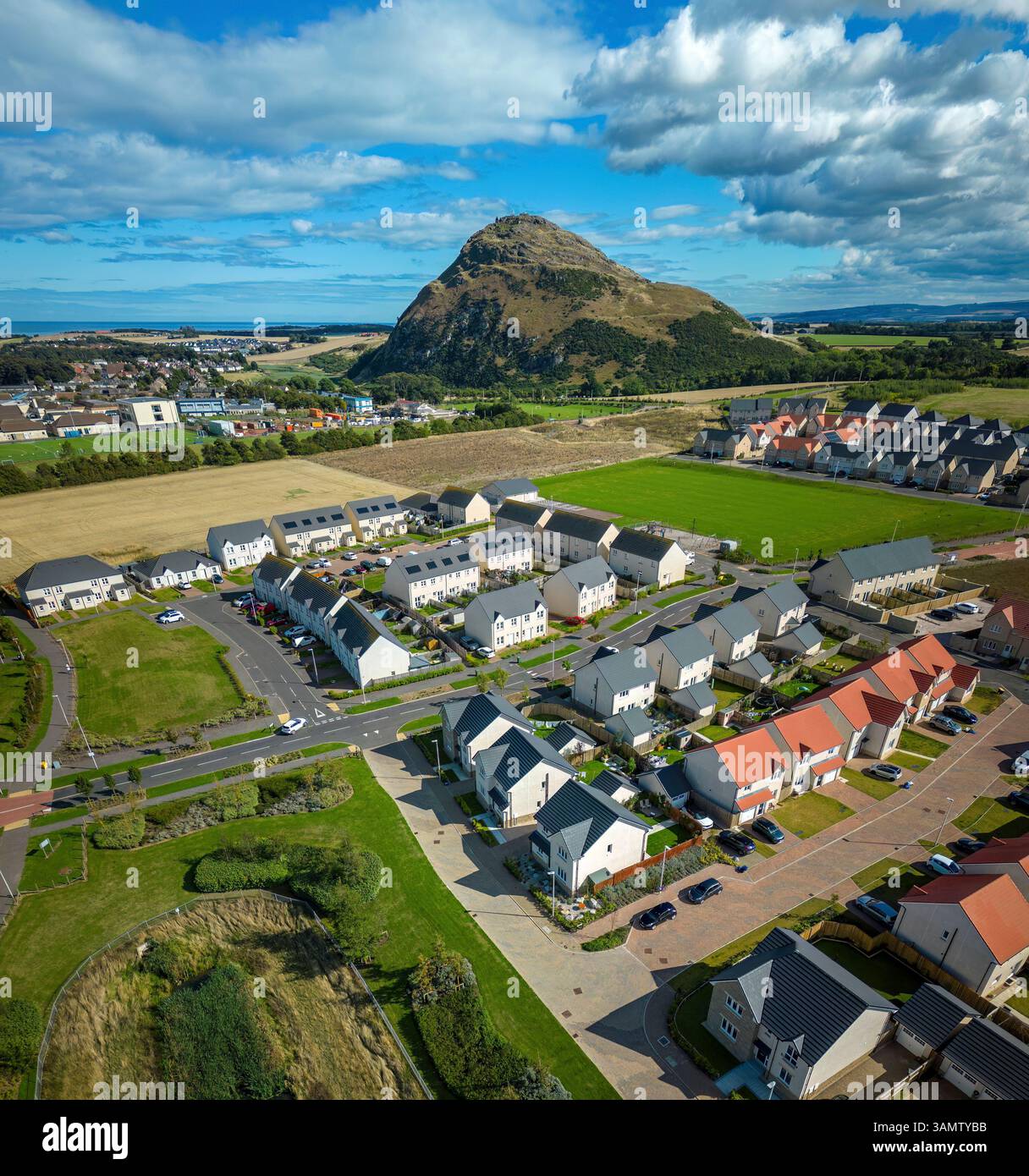 Aerial view of a beautiful coastal town with suburban houses and ...