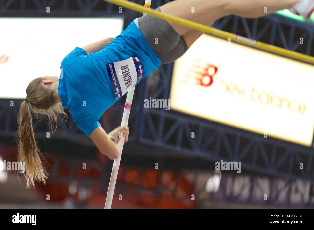 Pole vaulter goes over bar hi-res stock photography and images - Alamy