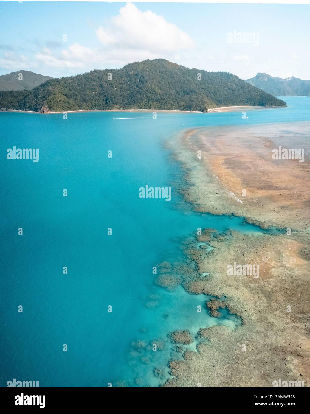 Aerial view of The Great Barrier Reef with clear blue water and Hook ...