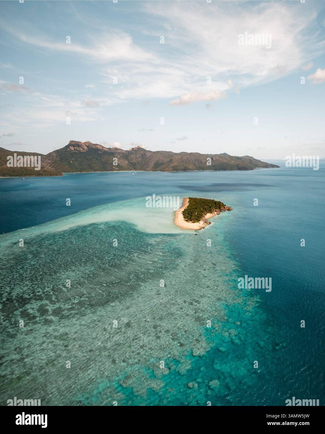 Aerial view of Black Island with the reef stretching far out and Hook ...