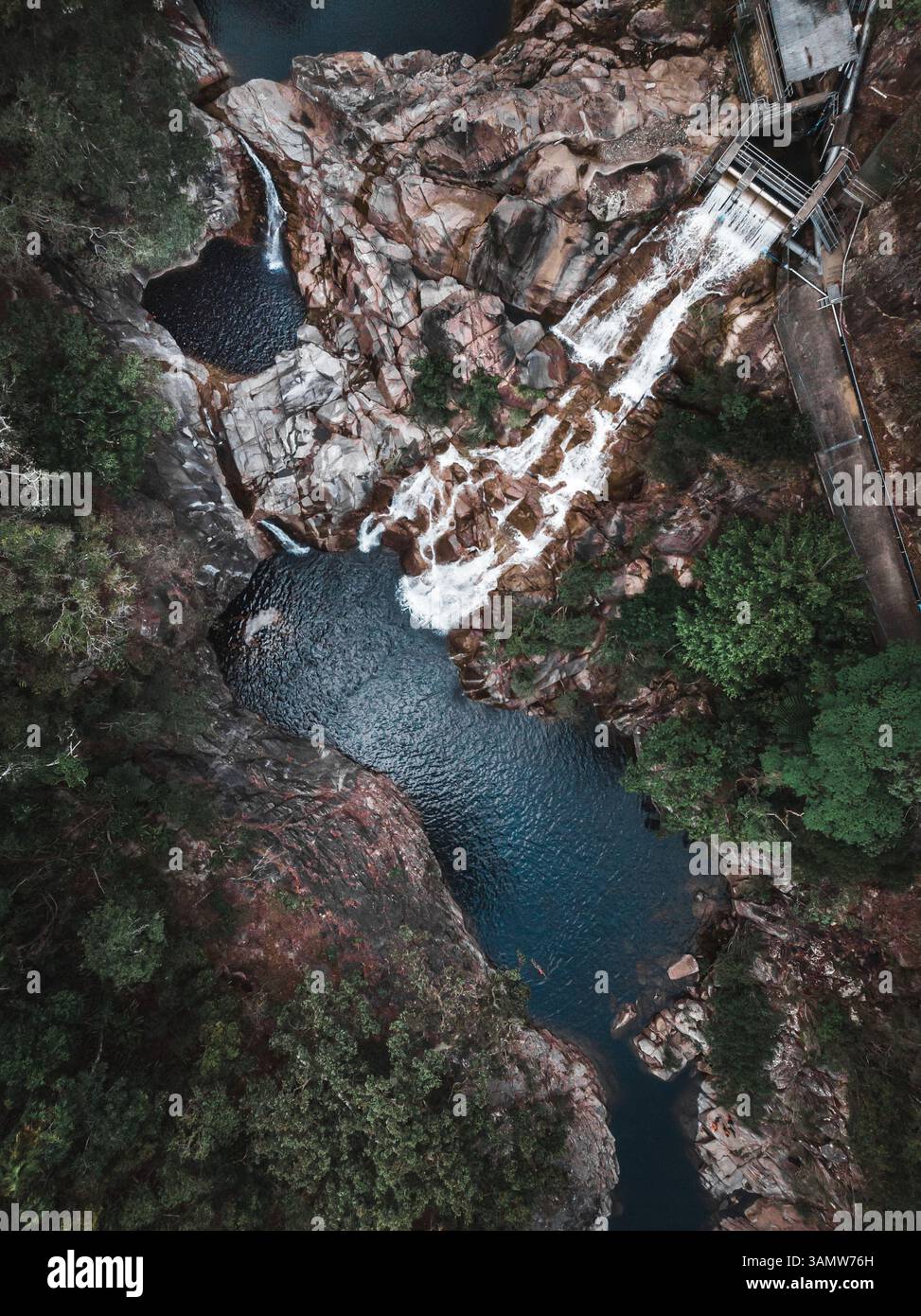 Aerial view of waterfalls in Behana Gorge with several levels of pools ...