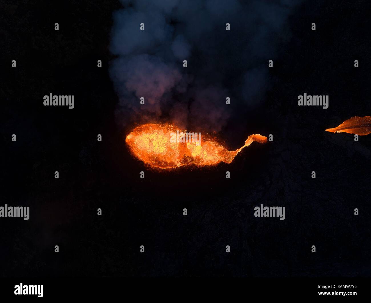 Aerial view of a lava explosion and the fog in Iceland Stock Photo - Alamy