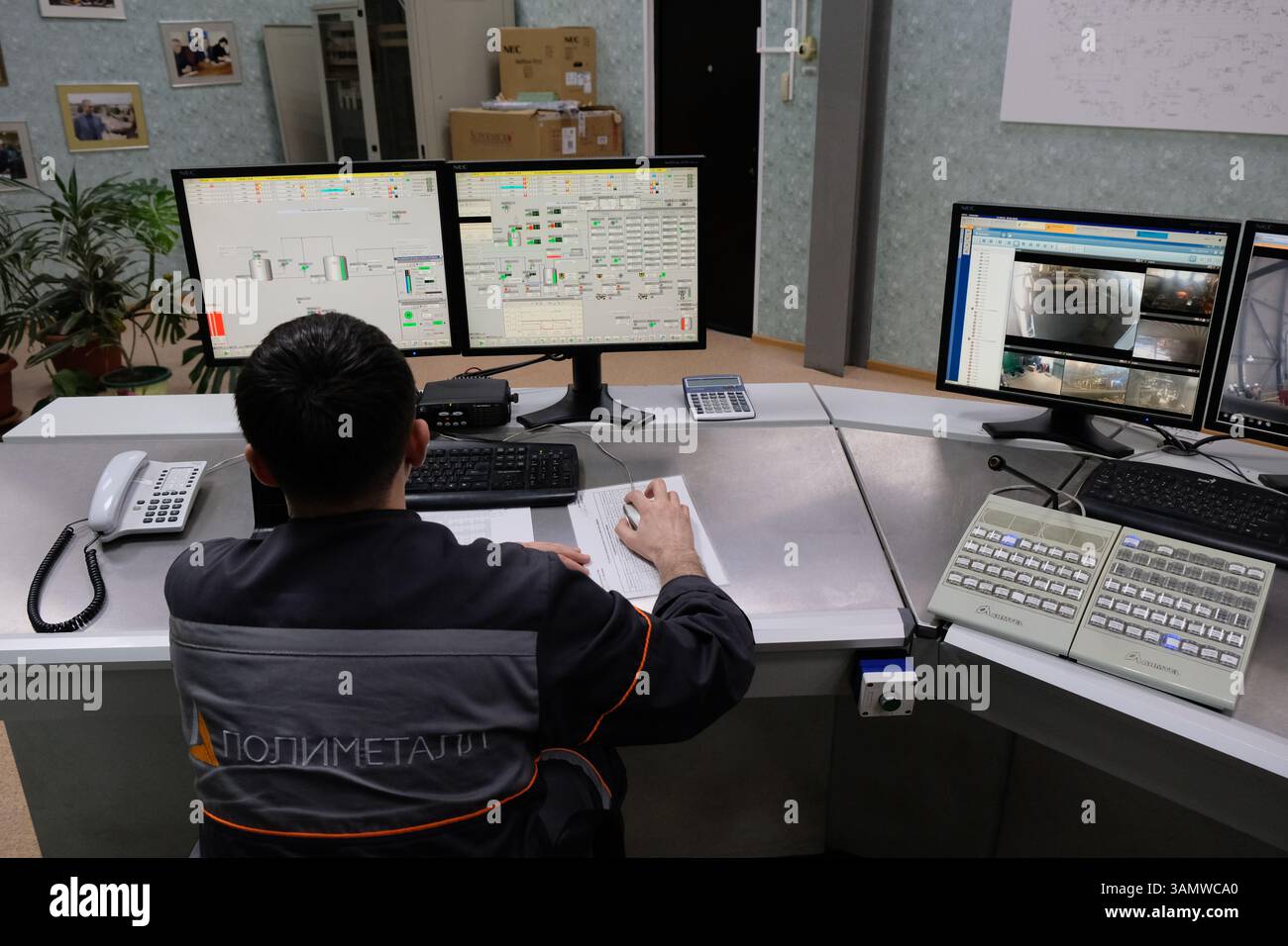 Maintenance staff monitor the sensor readings at the metallurgical ...