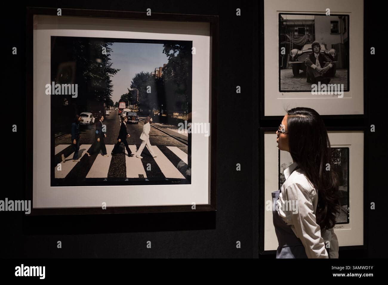 LONDON, UNITED KINGDOM - APRIL 14, 2025: A staff member looks at “The ...