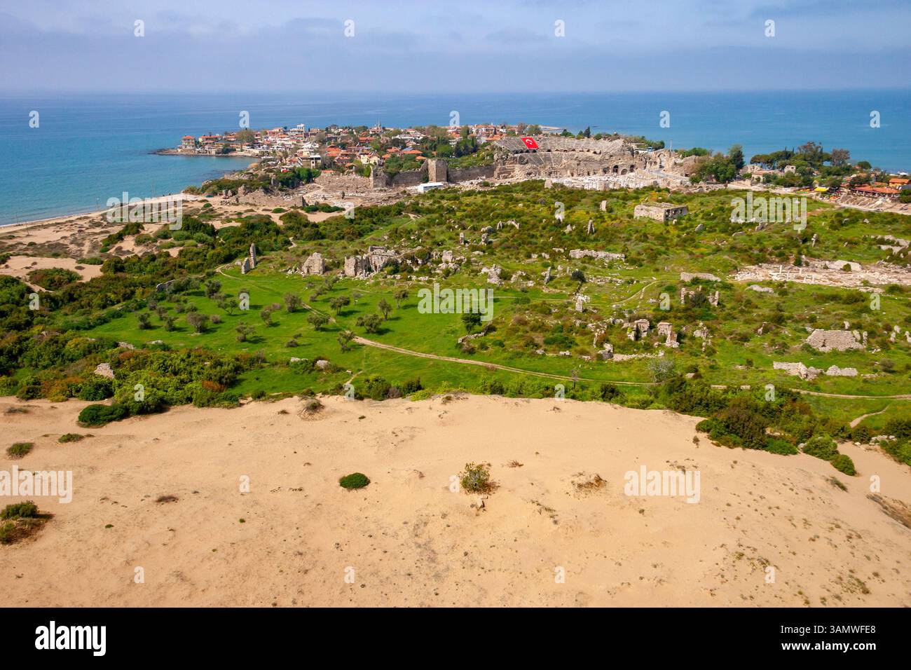 Aerial view of beautiful ancient ruins along the scenic coast and blue ...