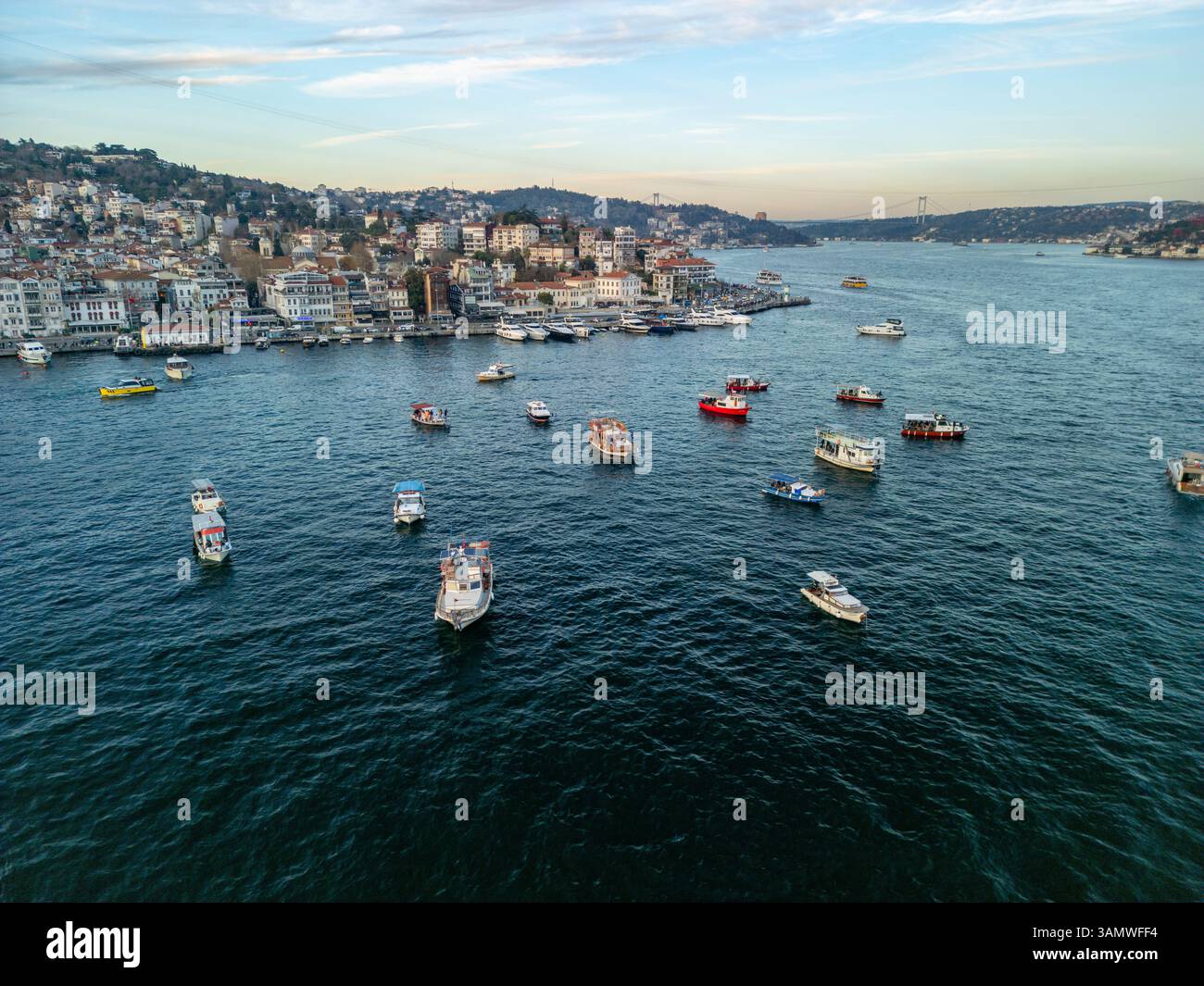 Aerial view of bustling fishermen and vibrant boats in a picturesque ...