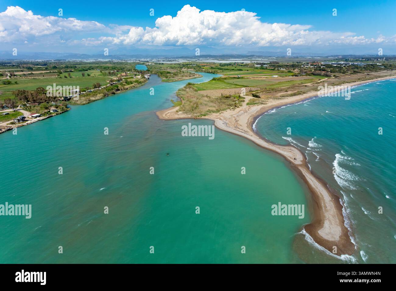 Aerial view of river flowing into the Mediterranean Sea on the Belek ...