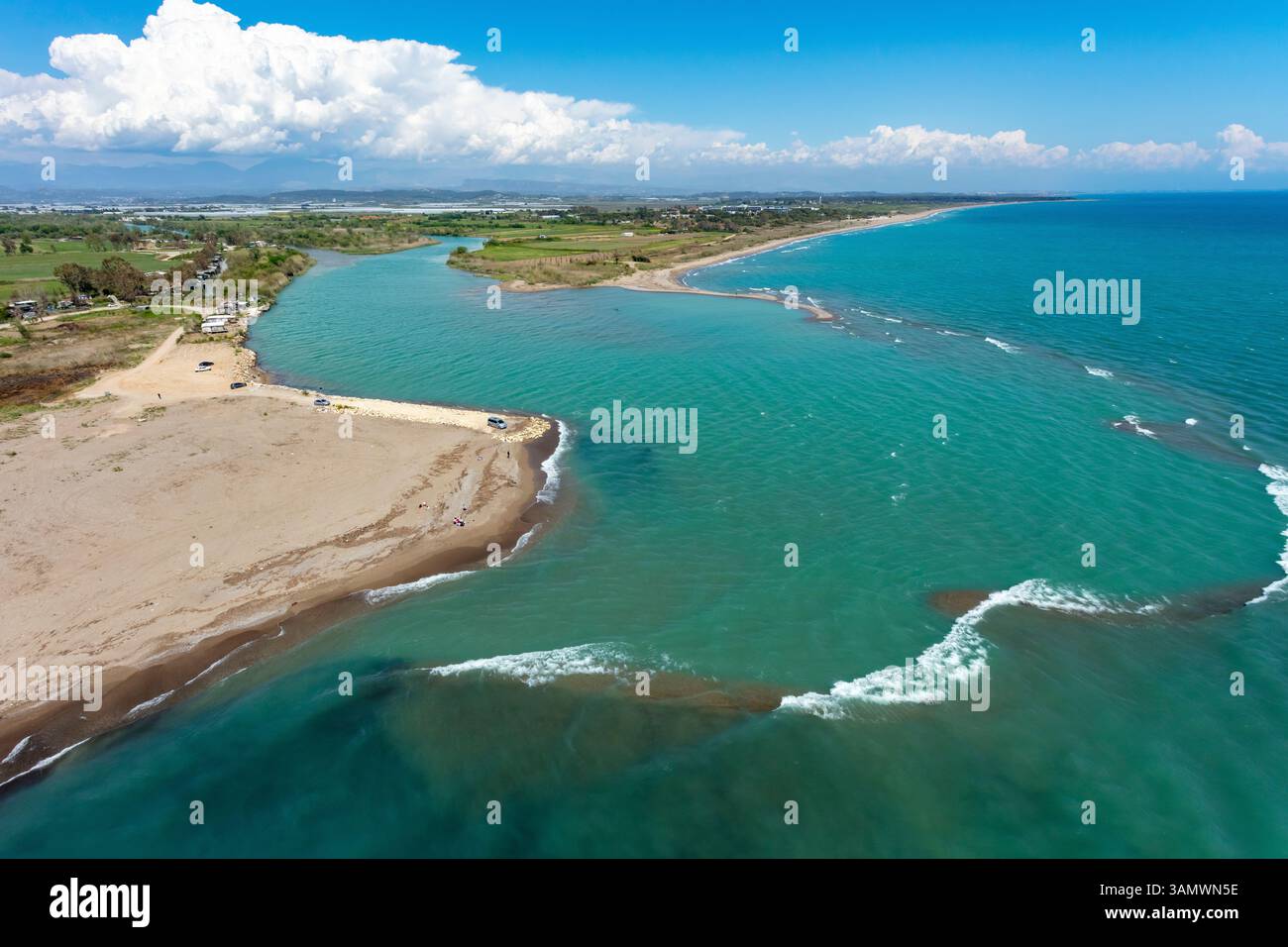 Aerial view of river flowing into the Mediterranean Sea on the Belek ...