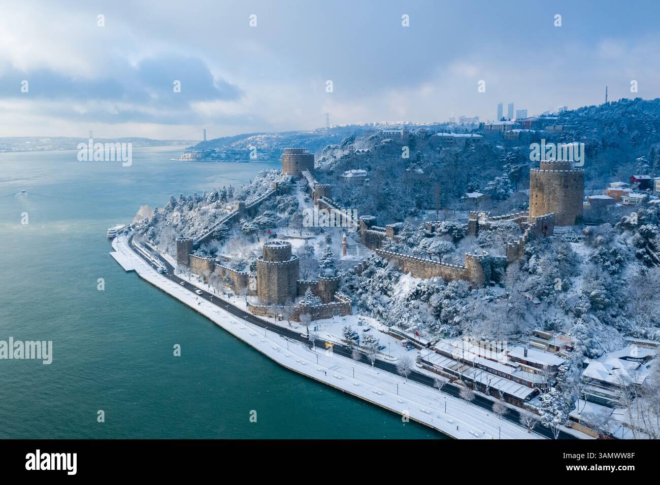Aerial view of Rumeli Hisarı Castle and the Bosphorus on a snowy day ...