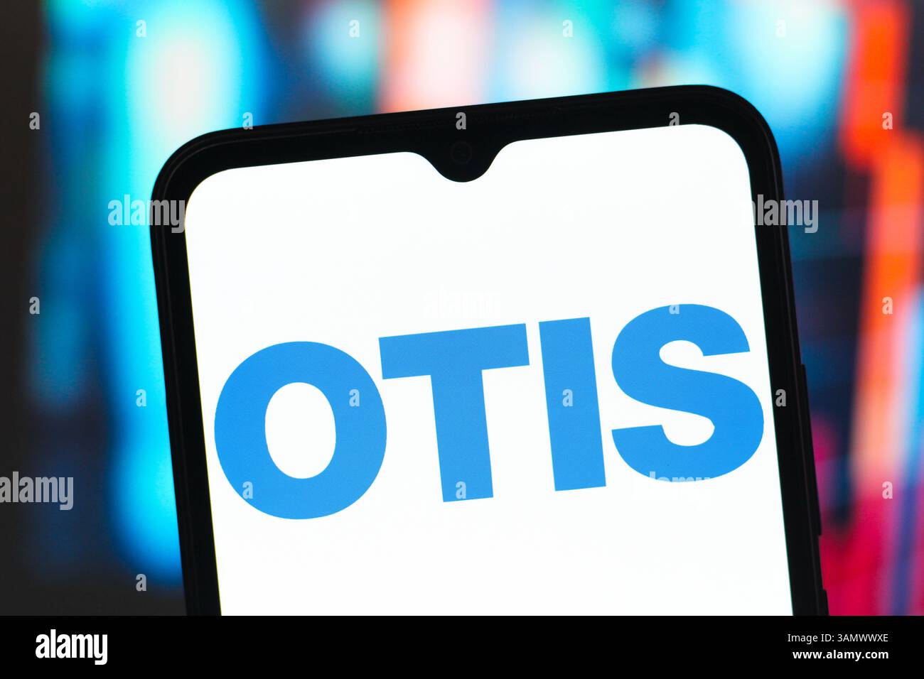In this photo illustration, the Otis Worldwide Corporation logo is seen ...