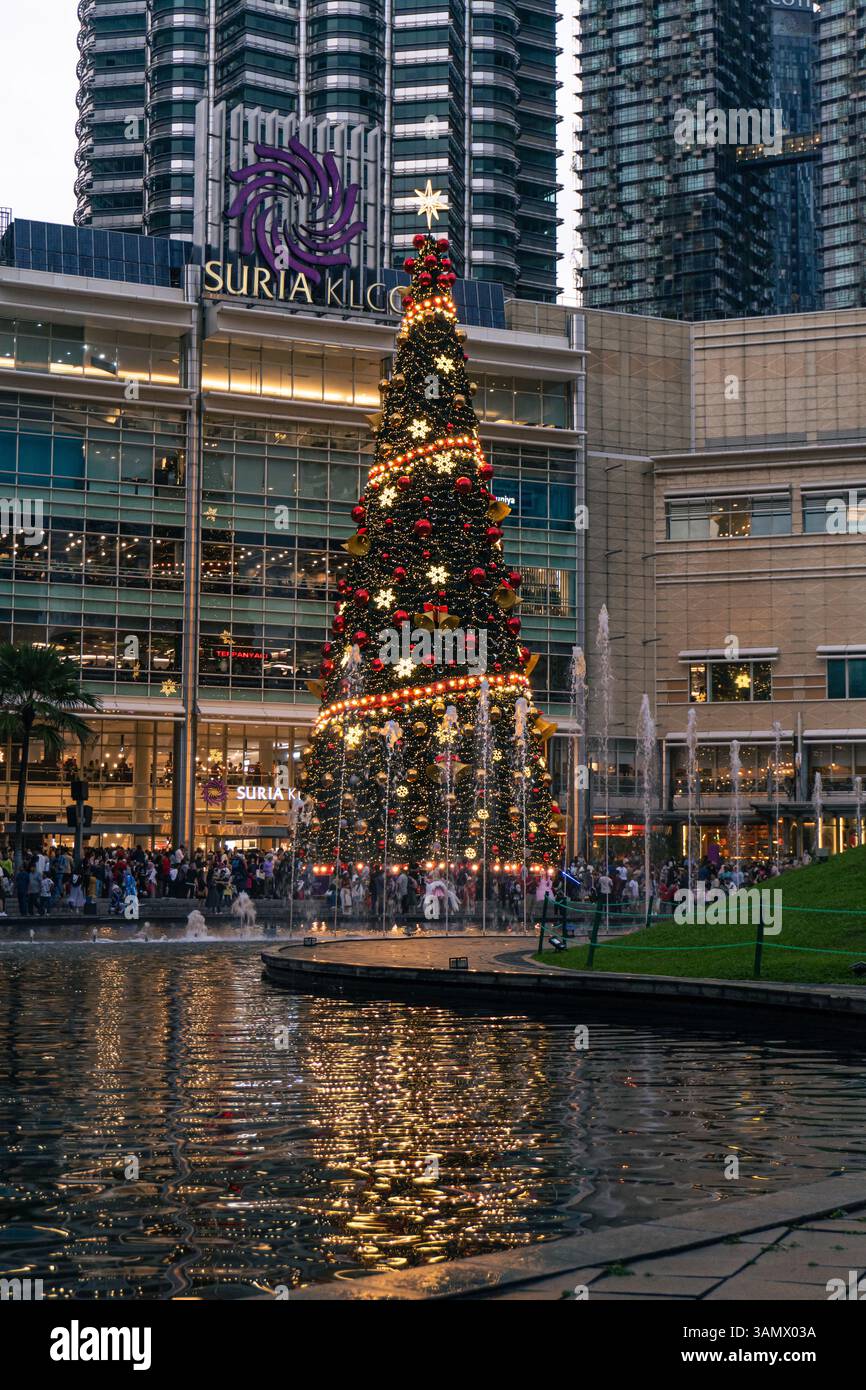 Kuala Lumpur, Malaysia: Reflections of Christmas Tree Lights at KLCC ...