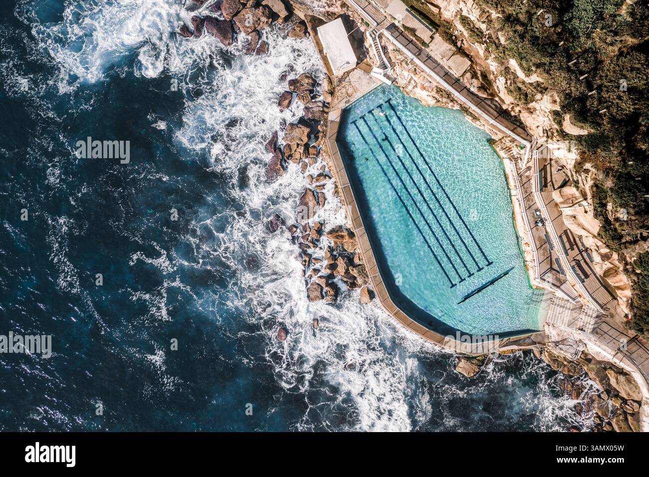 Aerial Top Down View Of Ocean Water Coastal Swimming Pool With Person ...