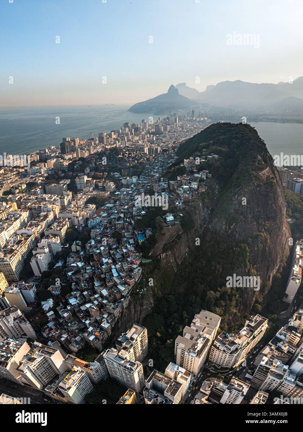 Aerial View Of Cantagalo Hill and Pavão Favela, Mountains in Distance ...