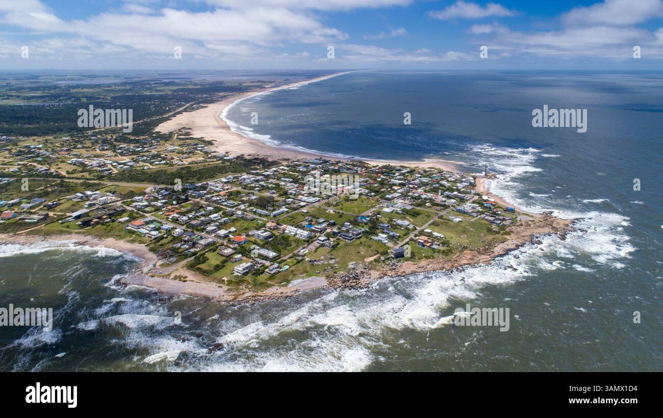 Aerial view of sandy beach and blue ocean waves, Jose Ignacio ...