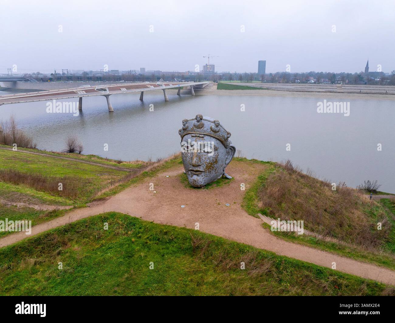 Aerial view of the roman mask sculpture and bridge over the river with ...