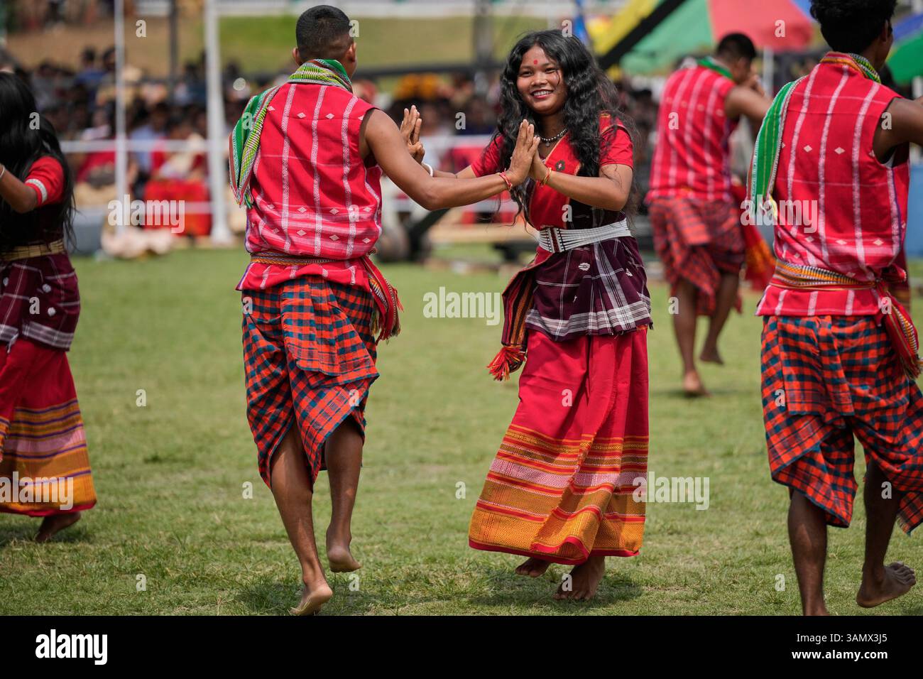 Rabha people wearing traditional traditional dresses perform the Rabha ...