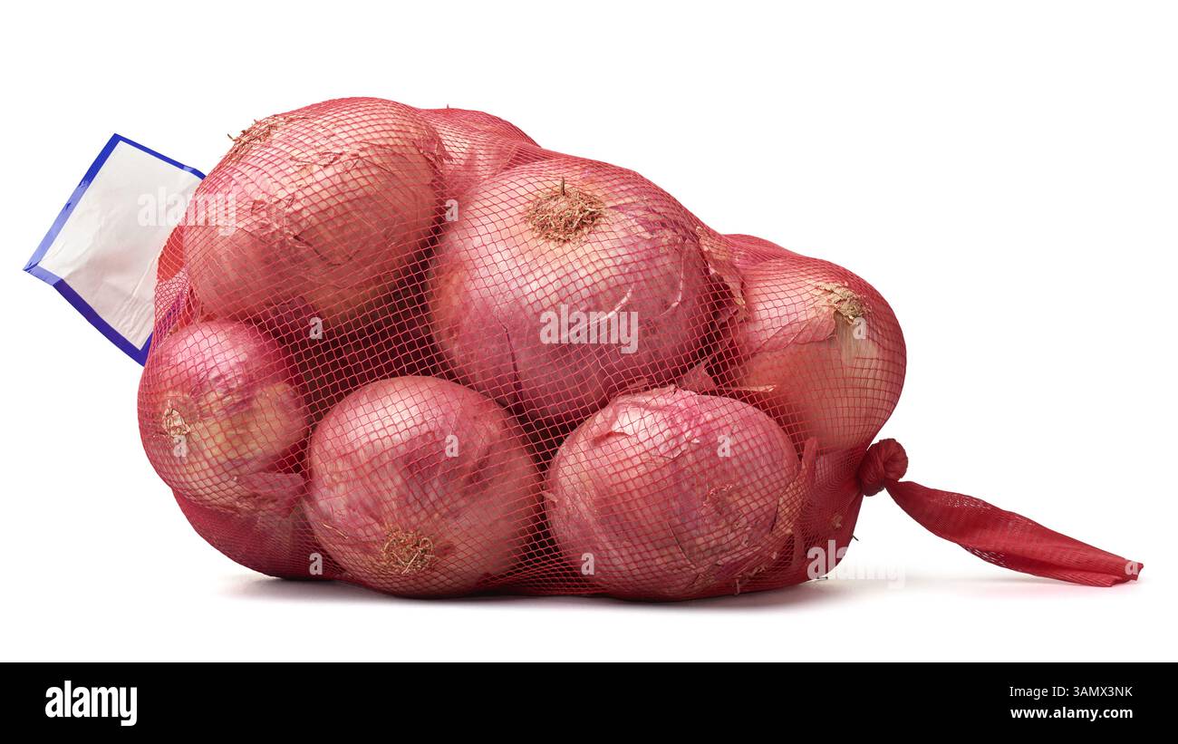 close-up of red onions in netted mesh bag isolated white background ...