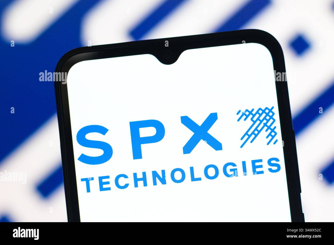 In this photo illustration, the SPX Technologies logo is seen displayed ...
