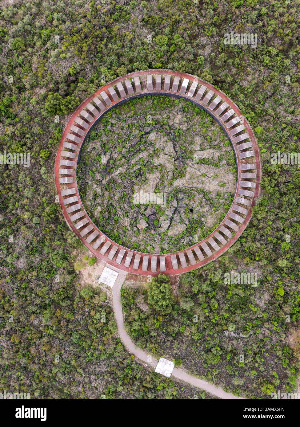 Aerial view of the circular art installation surrounded by greenery and ...
