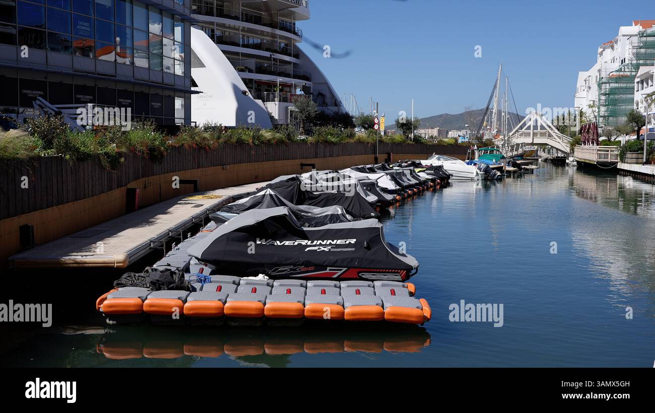 Covered jet skis sit on hi-res stock photography and images - Alamy