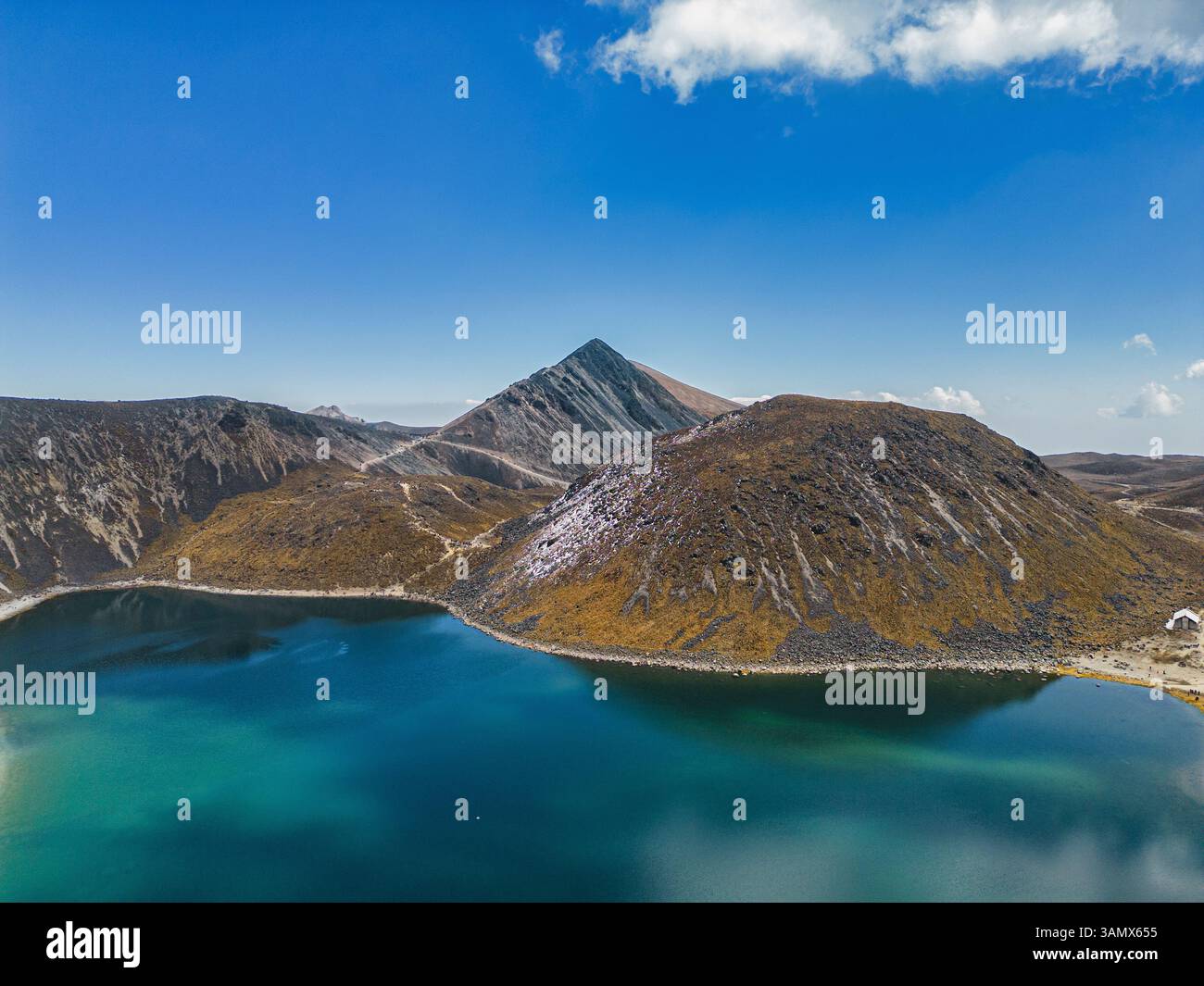 Aerial view of nevado de toluca crater with serene lake and majestic ...
