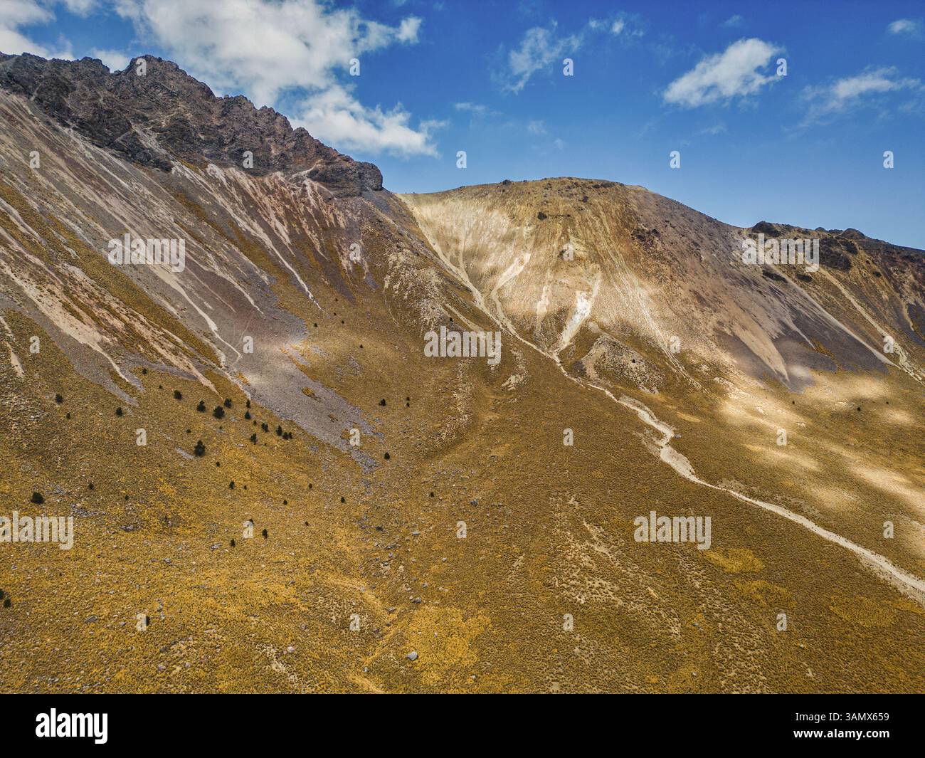 Aerial view of nevado de toluca crater surrounded by majestic mountains ...