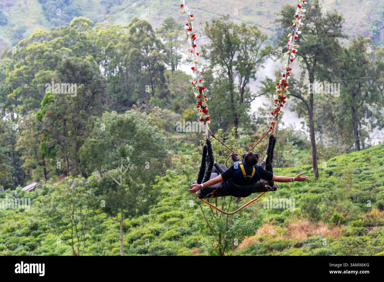 Ella, Sri Lanka, Asia - December 18, 2023: A visitor floats on the ...