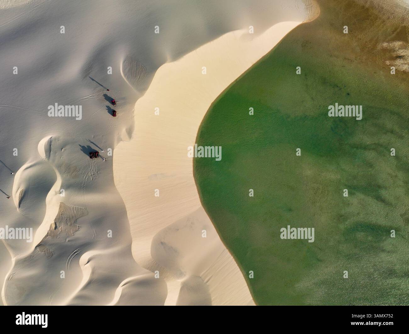 Aerial view of beautiful sand dunes and tranquil water in Lencois ...