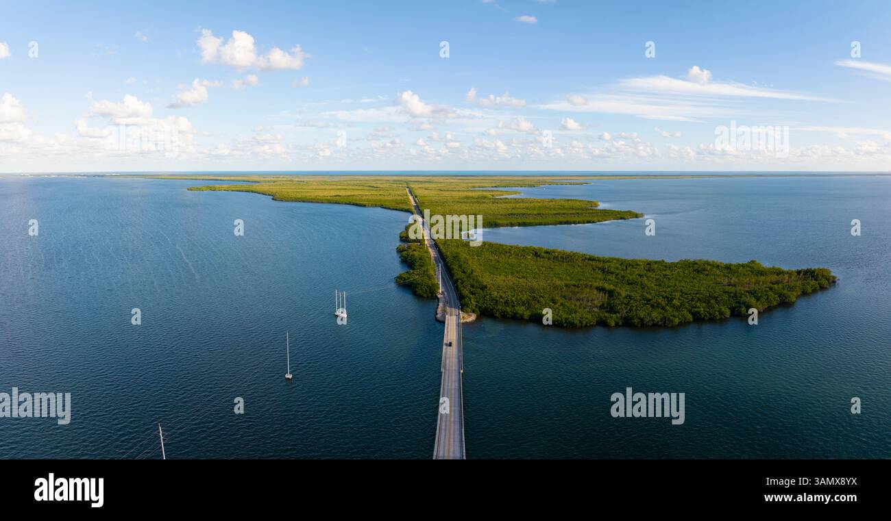 Aerial view of Card Sound Bridge over the tranquil ocean surrounded by ...