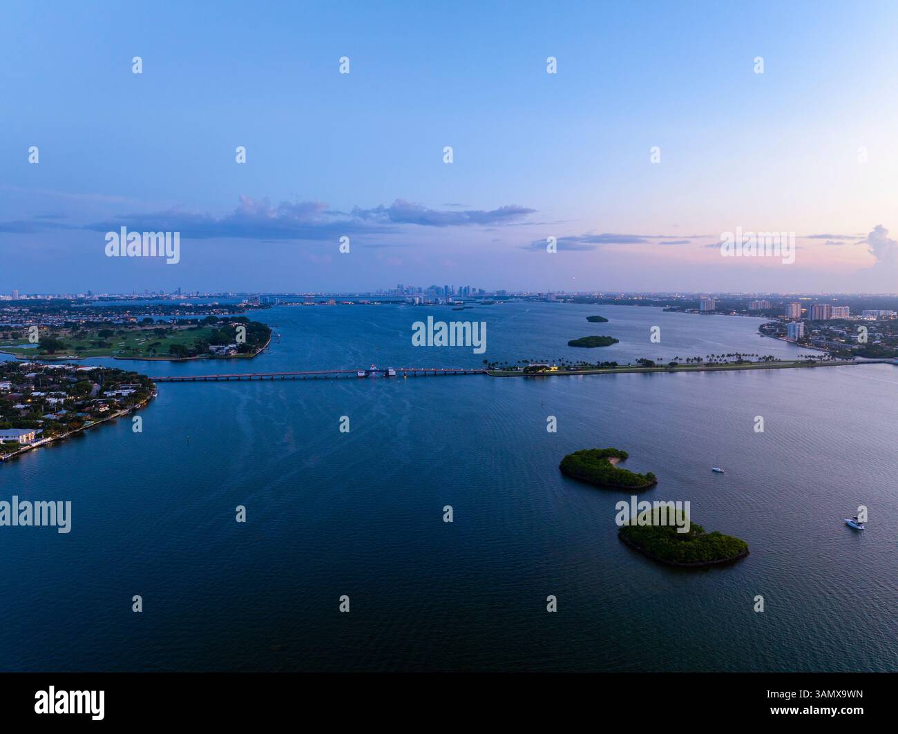 Aerial view of Biscayne Bay with bridge and cityscape, Bay Harbor ...