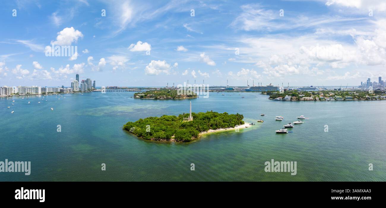 Aerial view of monument island in biscayne bay with beautiful cityscape ...
