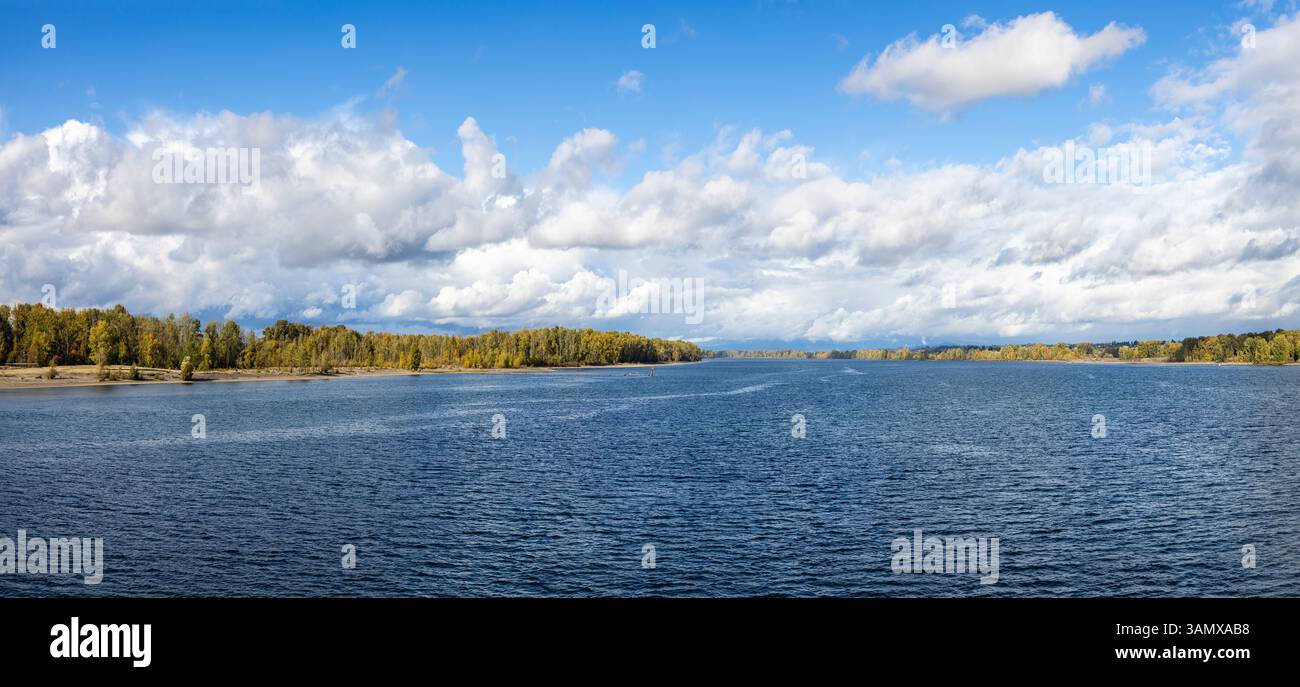 Aerial view of the serene Columbia River Gorge with calm reflections ...