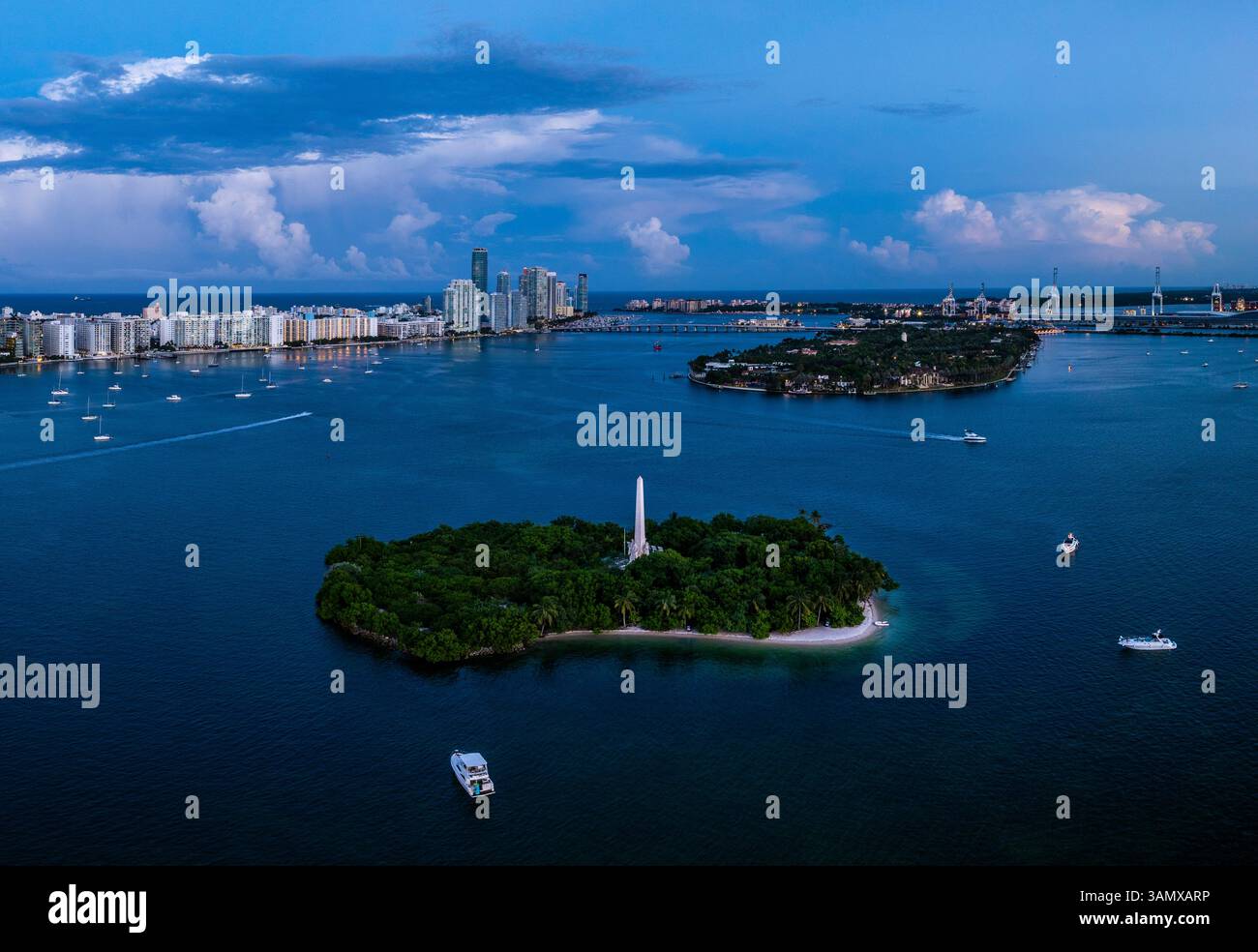 Aerial view of monument island in biscayne bay with beautiful skyline ...