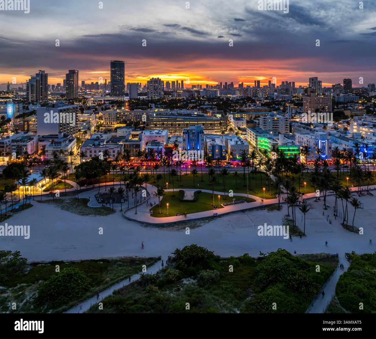 Aerial view of colorful cityscape with vibrant skyline and beachfront ...